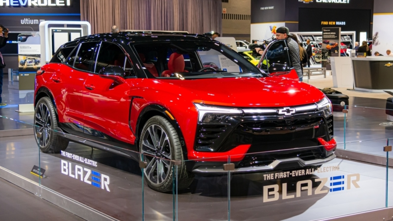 The true costs of owning a luxury SUV compared to a mid-size electric ...